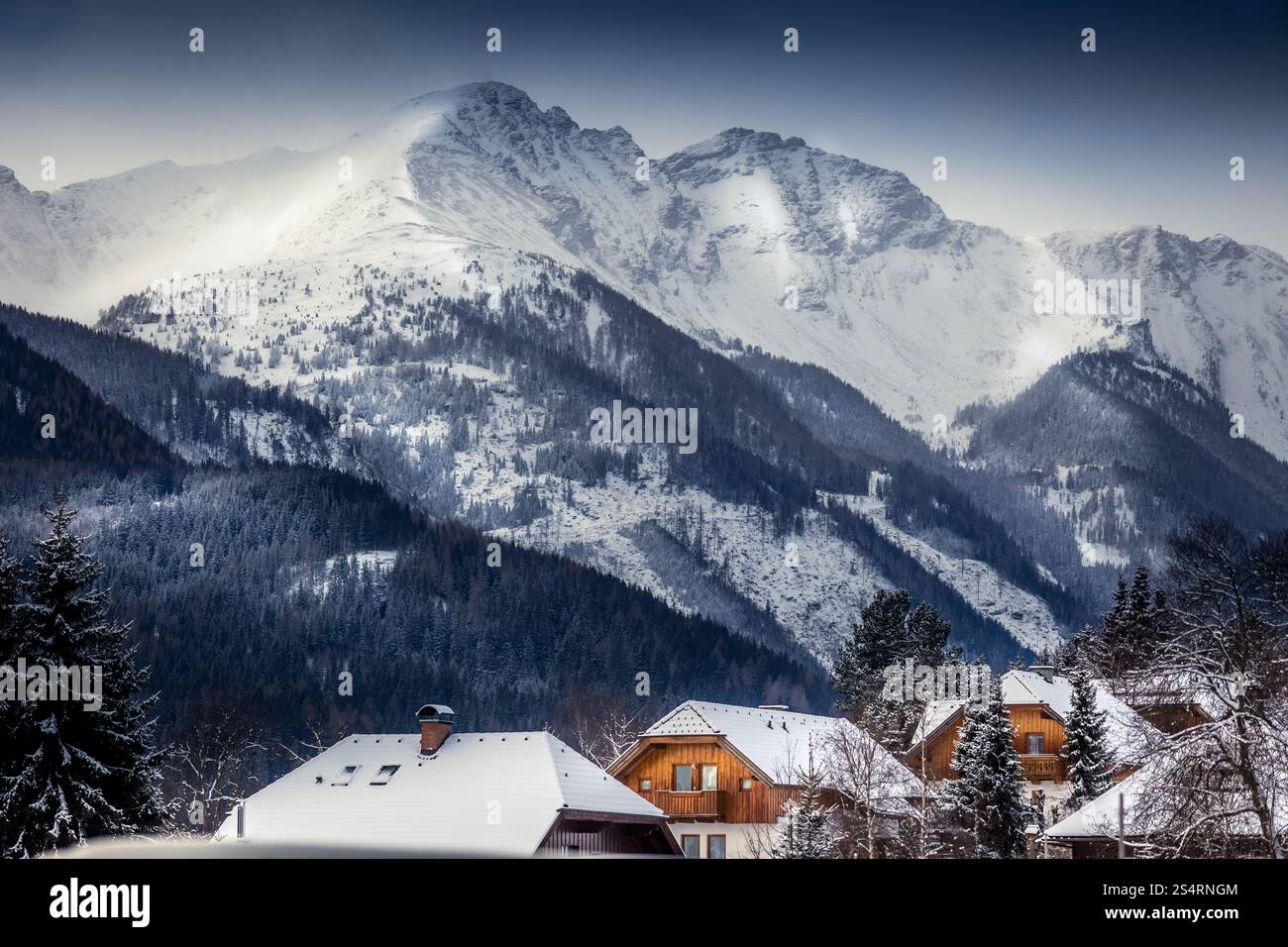 Beautiful landscape of high Austrian Alps with traditional houses ...