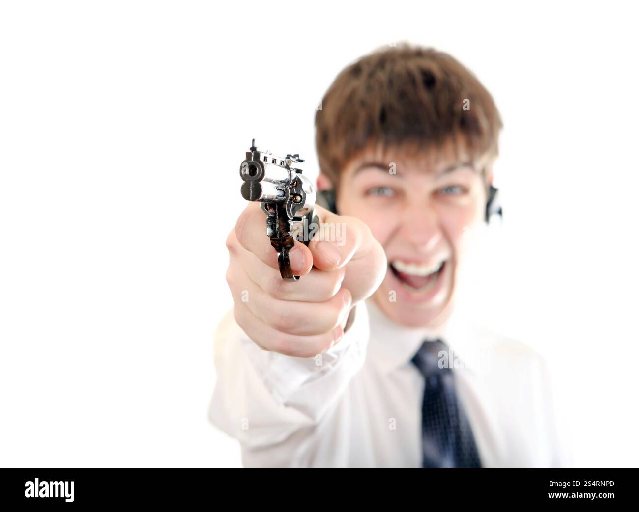 Angry Teenager with a Pistol on the White Background Stock Photo - Alamy