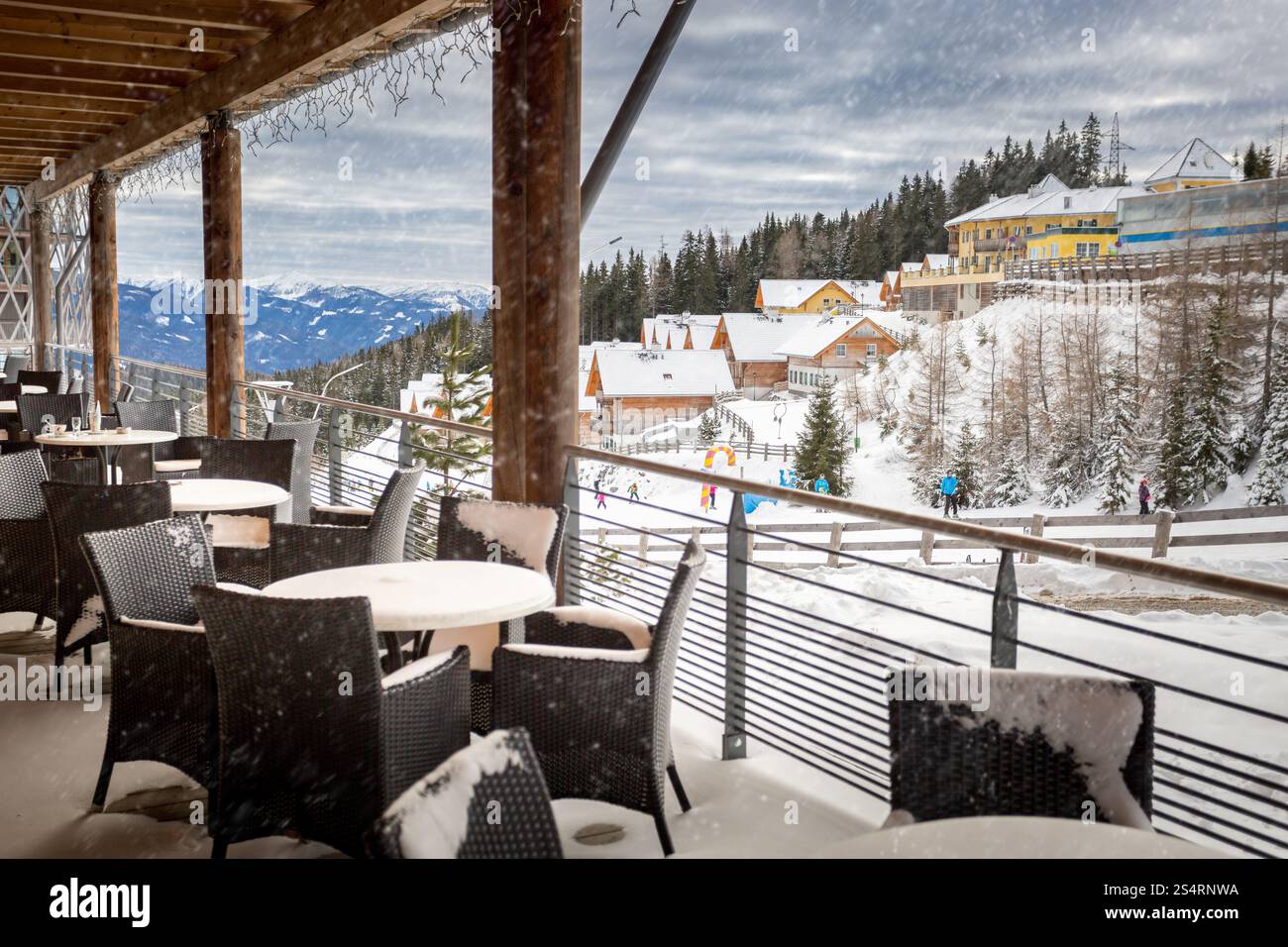 Beautiful terrace covered by snow at ski resort restaurant Stock Photo - Alamy