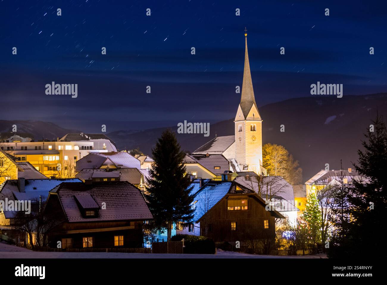 Beautiful highland Austrian town with big tower at night Stock Photo ...