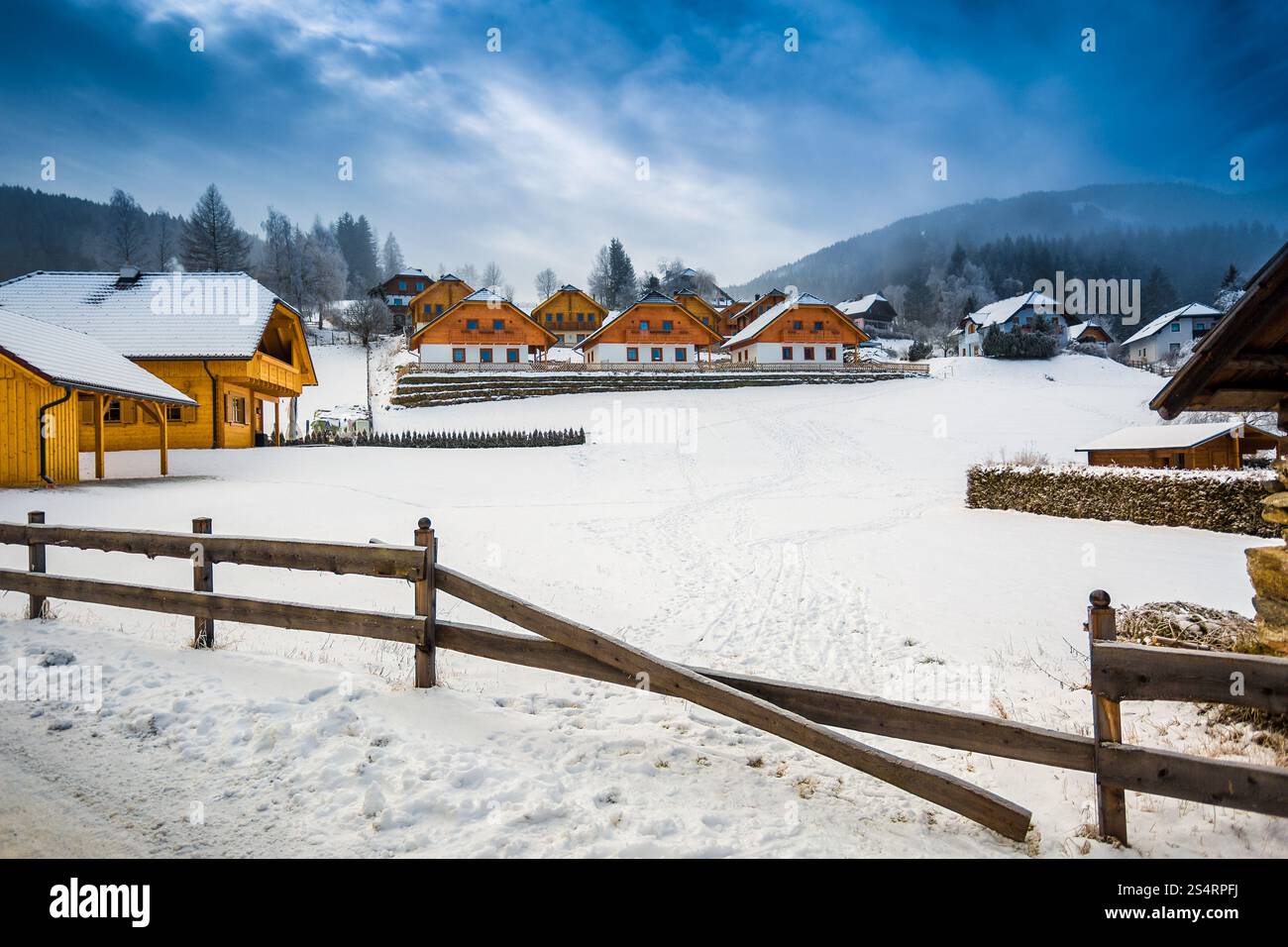 Beautiful winter view of farm on mountain at Austrian town Stock Photo ...
