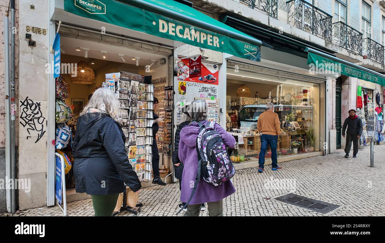 A traditional Portuguese artisan store with colorful signs and wooden ...