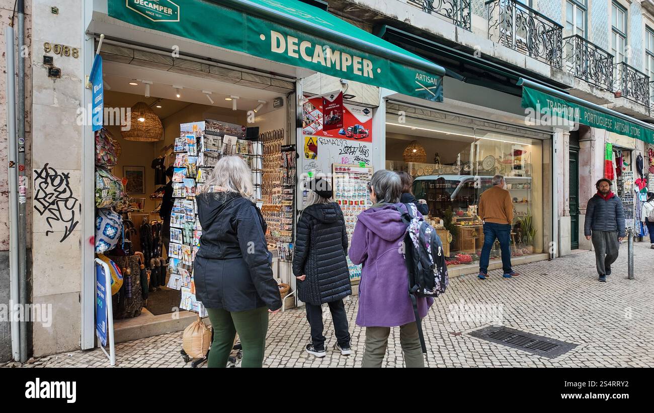 A traditional Portuguese artisan store with colorful signs and wooden ...