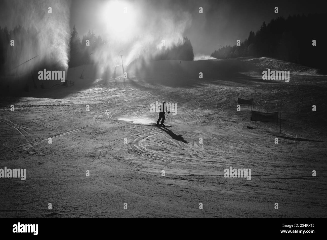 Black and white photo of skier riding on slope at sunny day Stock Photo ...