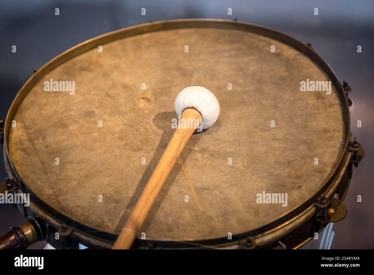 Closeup photo of old war drum with drumstick Stock Photo - Alamy