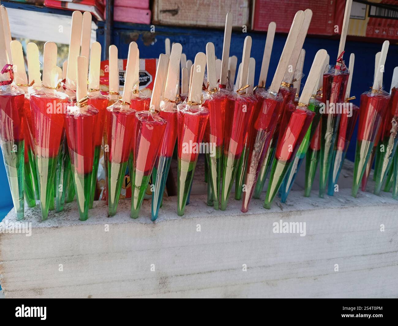 Red and green cone-shaped candy lollipop, which was bought at the ...