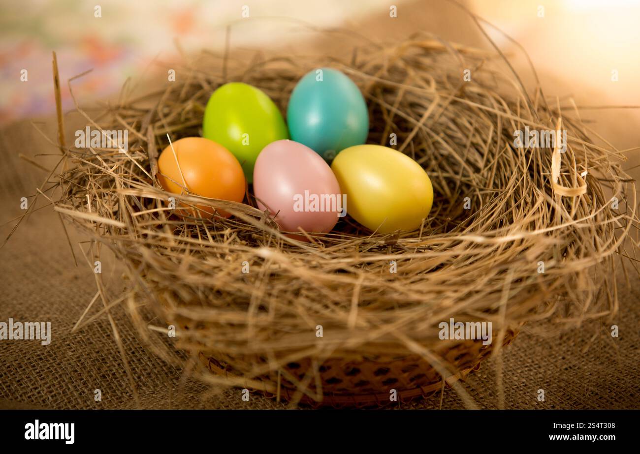 Five Easter eggs lying on table at nest Stock Photo - Alamy