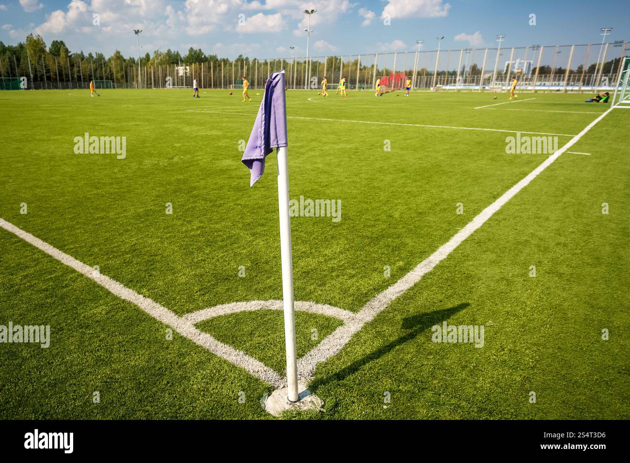 Blue corner flag on soccer field at sunny day Stock Photo - Alamy