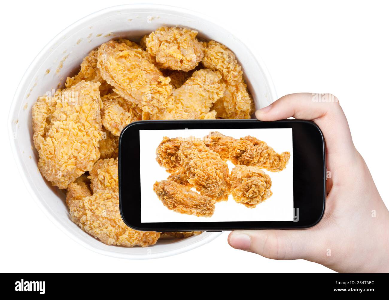 photographing food concept - tourist takes picture of hot fried chicken ...