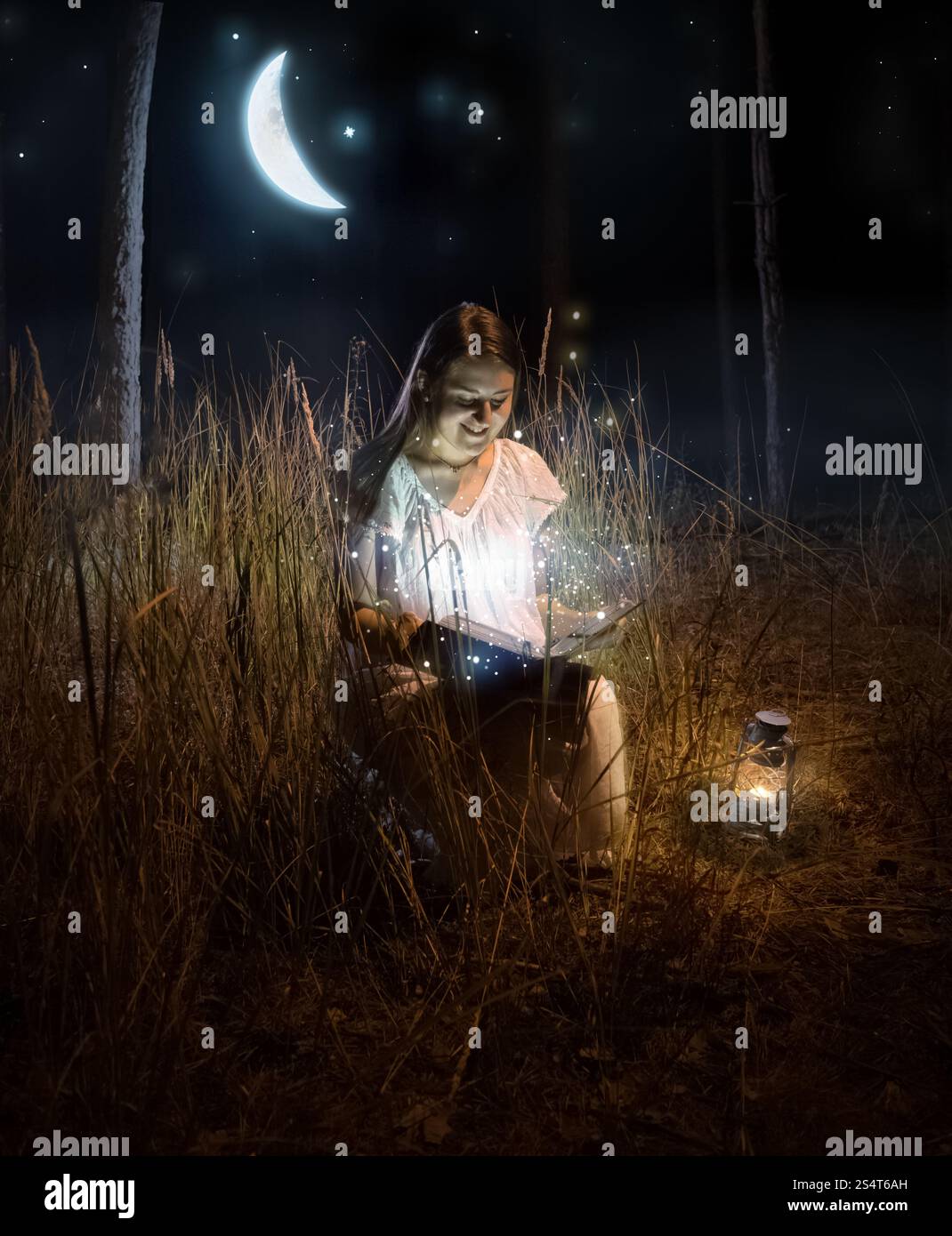 Magical photo of beautiful woman sitting at night forest and reading ...