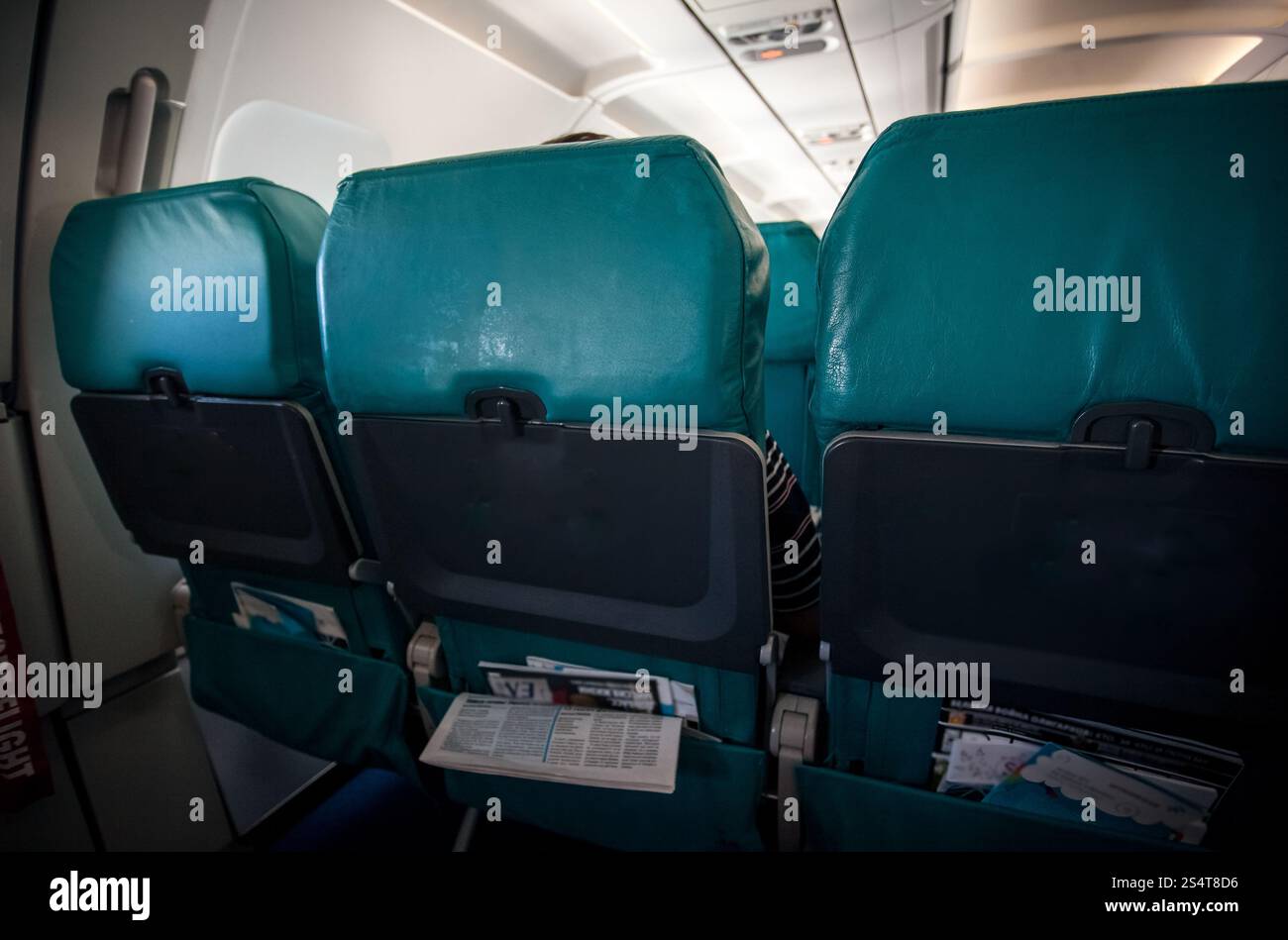 Photo of row of airplane seats in low cost aircraft Stock Photo - Alamy