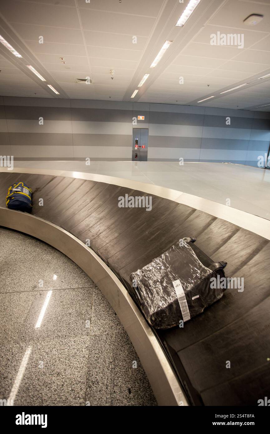 Photo of baggage claim line in airport terminal Stock Photo - Alamy