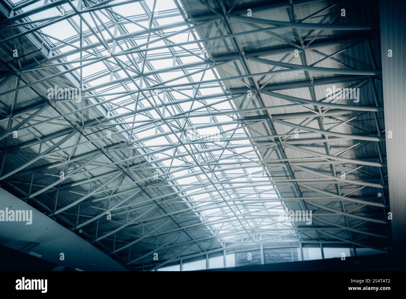 Big metal roof with long panoramic windows at airport terminal Stock ...