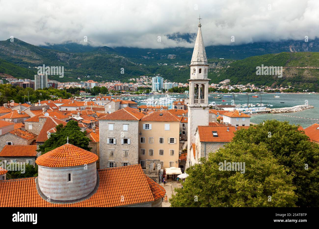 Beautiful landscape of old city with red roofs and high tower Stock ...