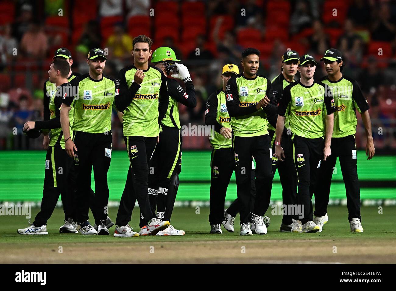 Sydney, Australia. 13th Jan, 2025. Players of Sydney Thunder celebrate ...