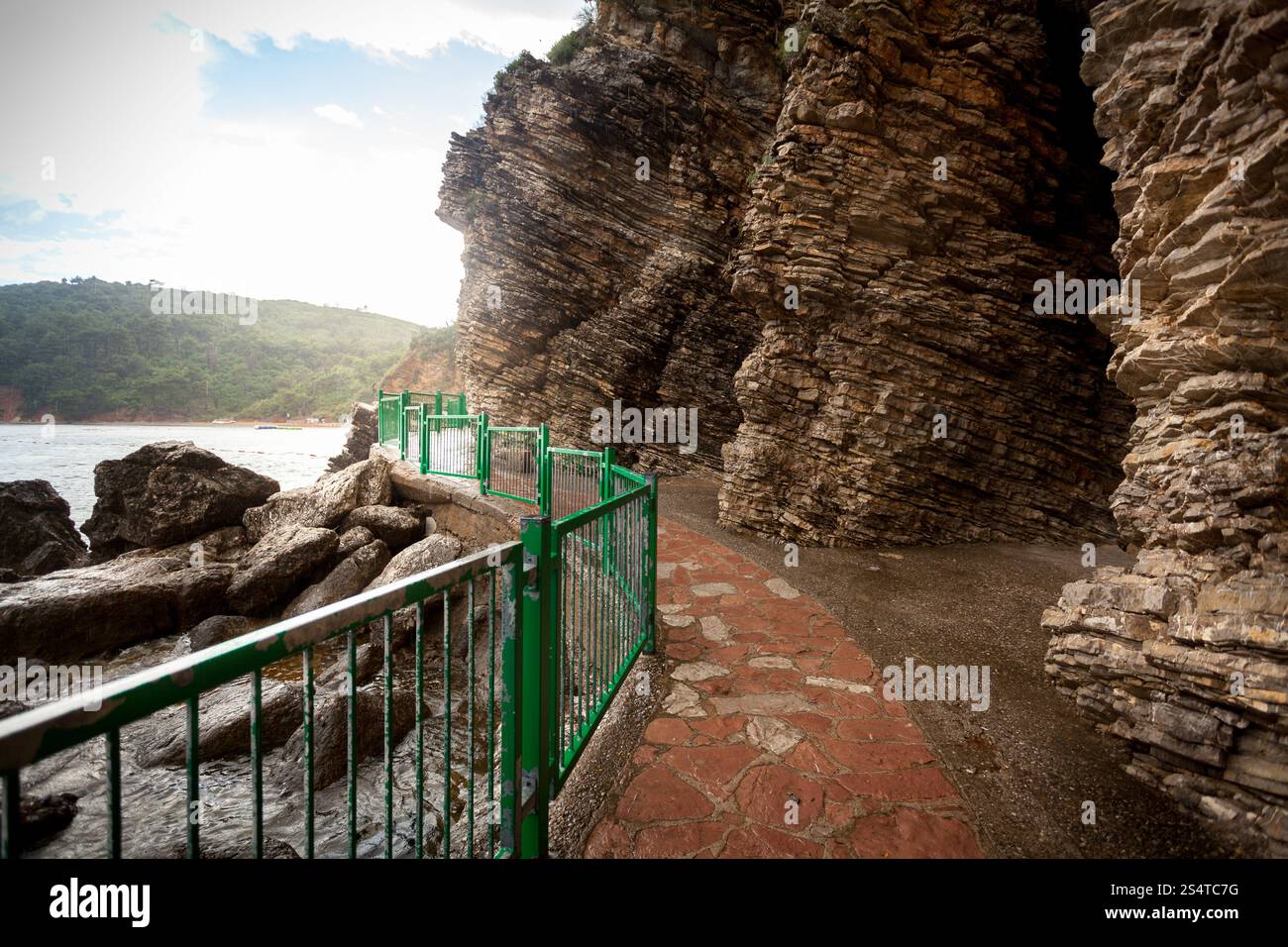 Beautiful walkway in high cliffs at seaside Stock Photo - Alamy
