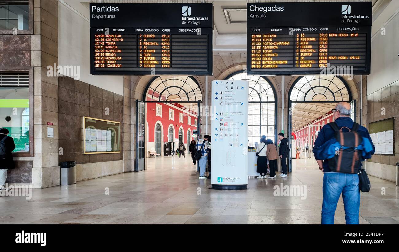 Interior of Lisbon's Santa Apolónia station showing train departure and ...