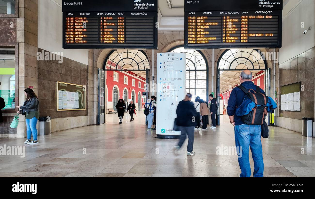 Interior of Lisbon's Santa Apolónia station showing train departure and ...