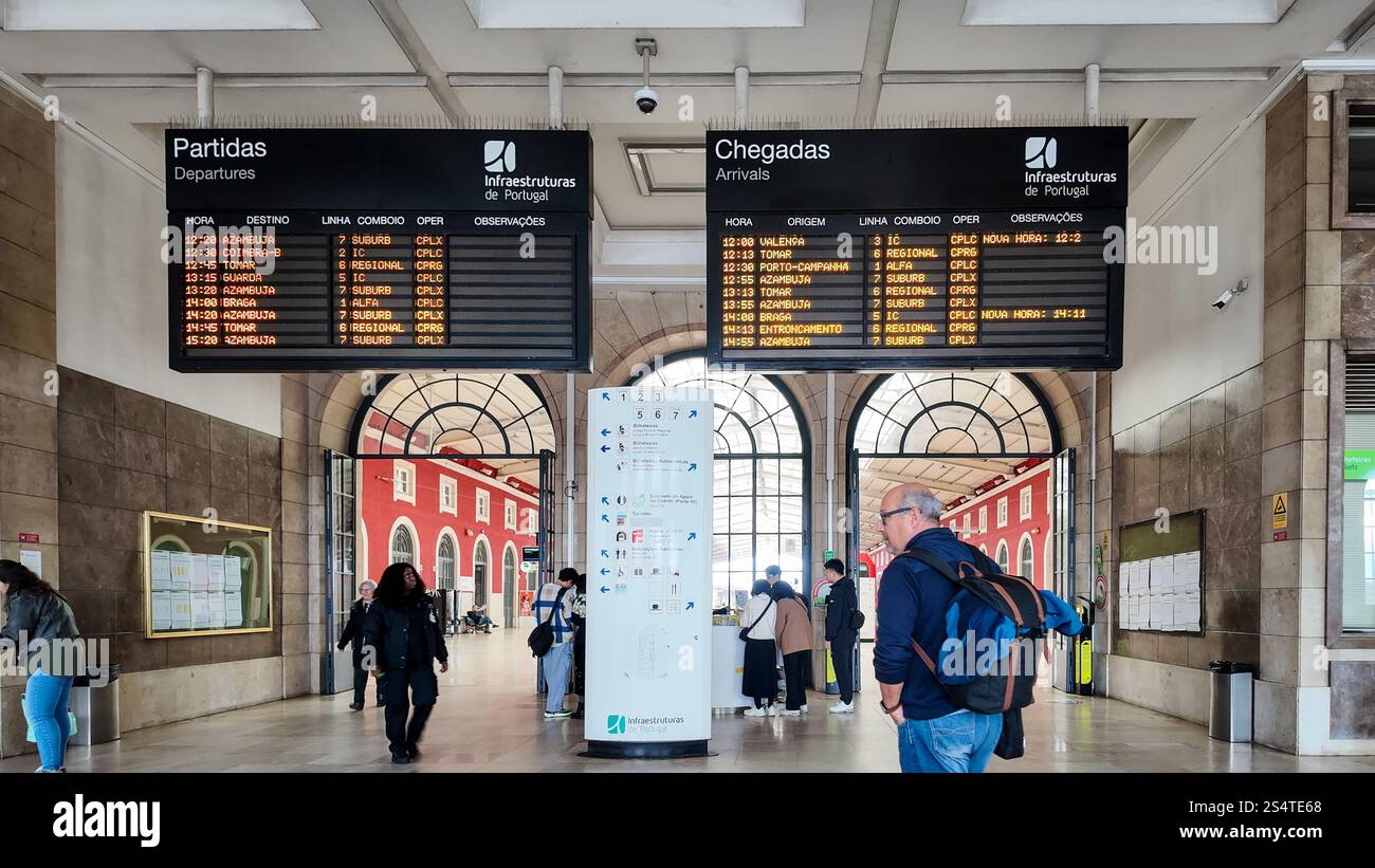 Interior of Lisbon's Santa Apolónia station showing train departure and ...