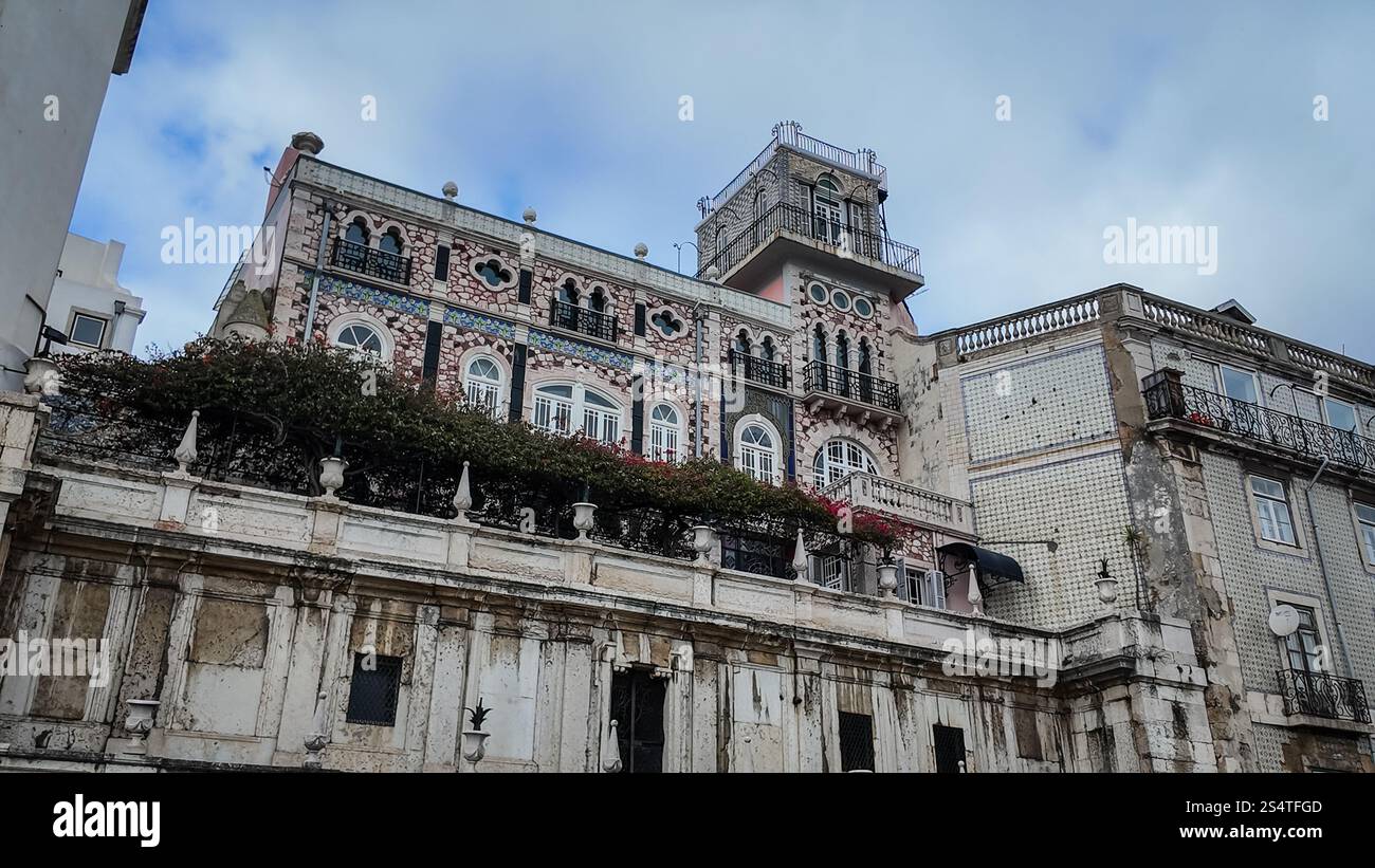 The exterior of Chafariz d'El-Rei in Lisbon, showcasing its historic ...