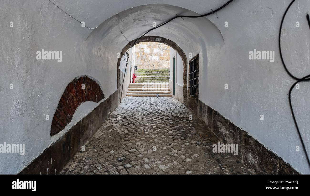 A tunnel leading to the historic Jewish Quarter in Lisbon's Alfama ...