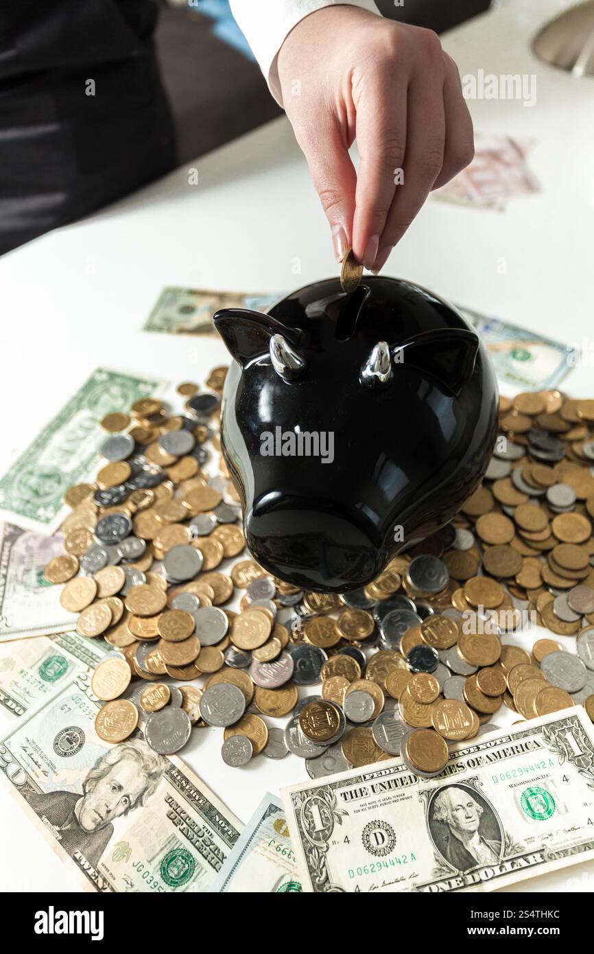 Women hand putting gold golden hi-res stock photography and images - Alamy