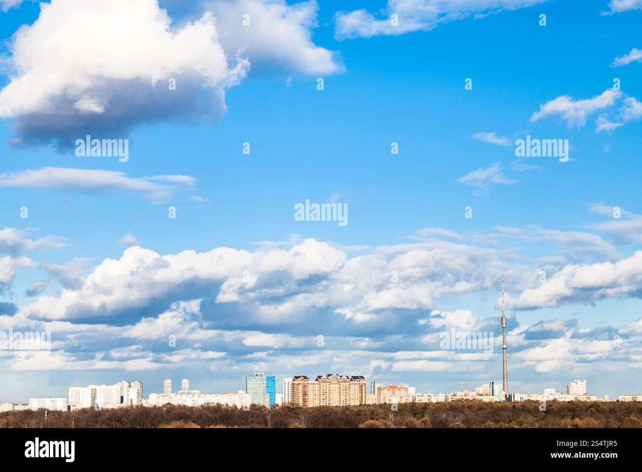 white clouds in blue spring sky over city, Moscow Stock Photo - Alamy