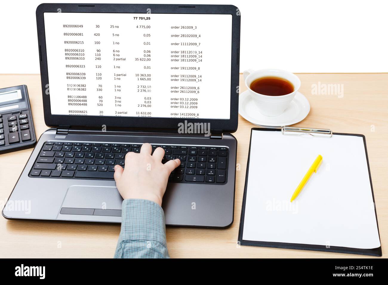 business still life - laptop with data on screen on office table ...