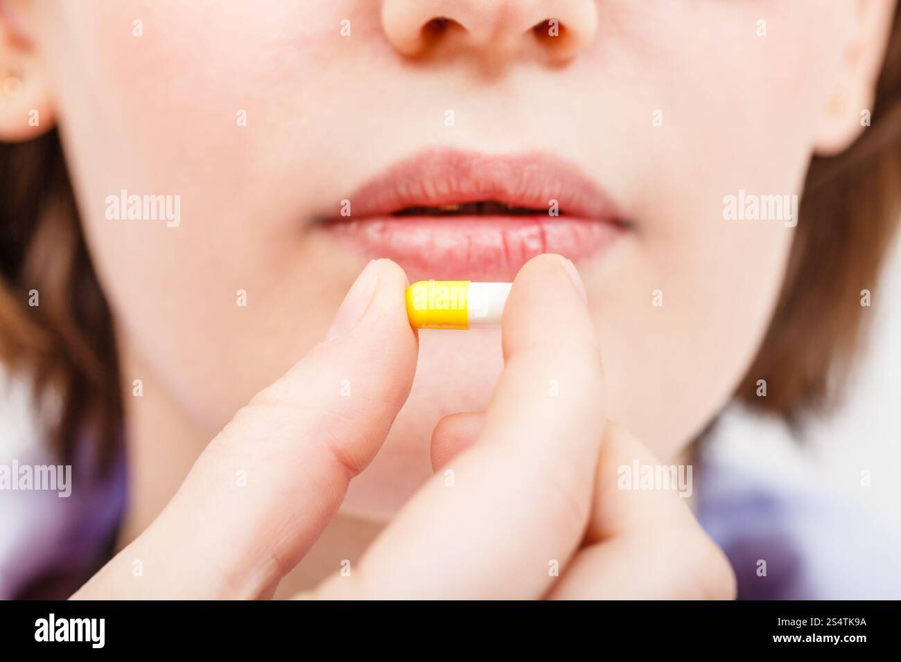 patient takes pill close up Stock Photo - Alamy