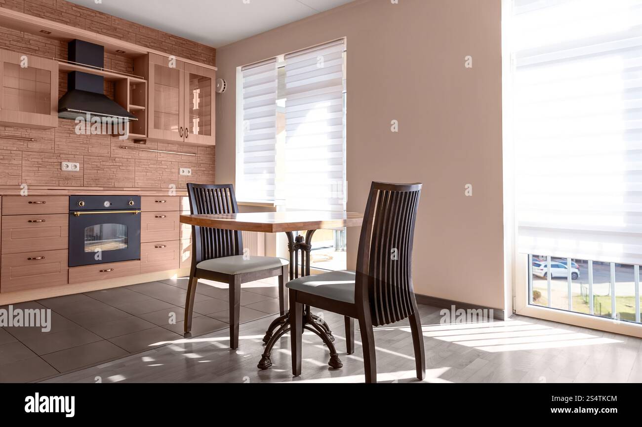 Modern interior of a combined kitchen and living room with colors of ...