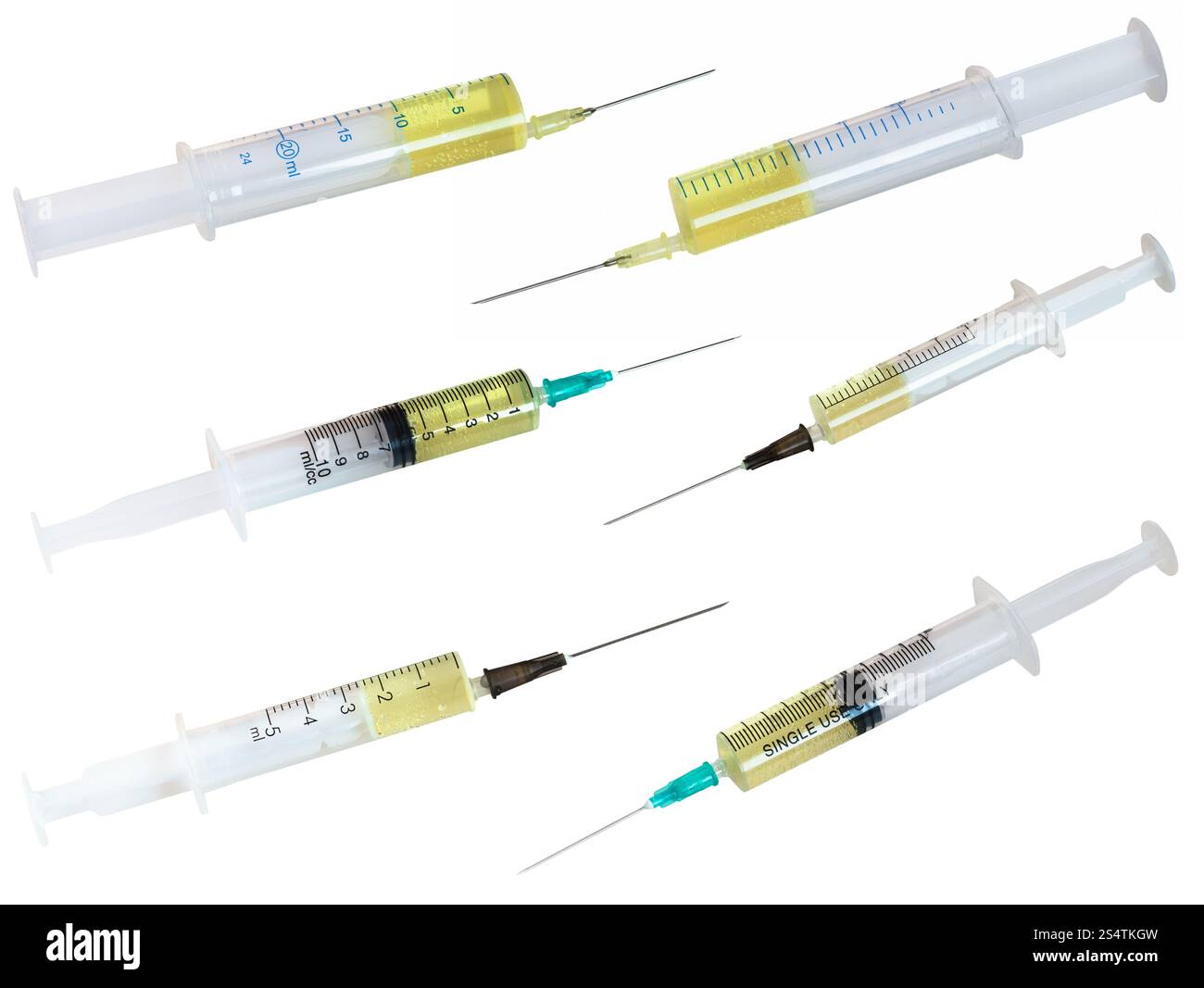 set of syringes filled with yellow liquid isolated on white background ...
