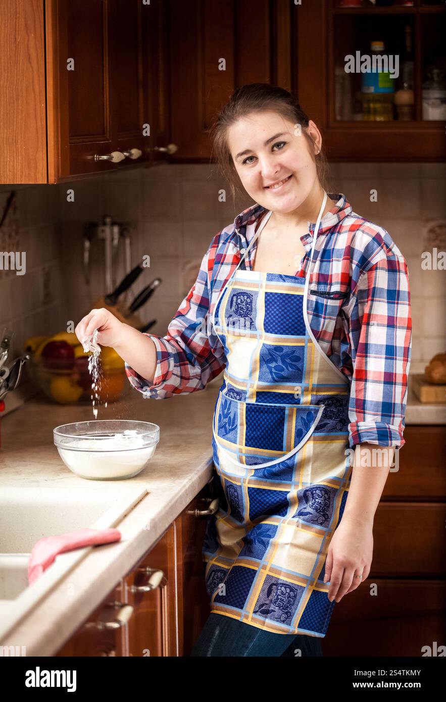 Closeup photo of housewife mixing flour in bowl Stock Photo - Alamy
