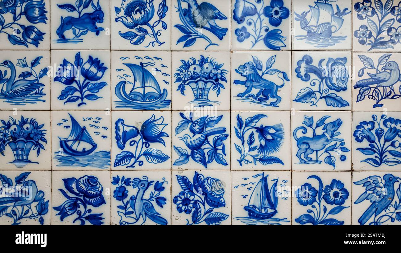 Blue and white azulejos tiles adorn a wall, showcasing intricate ...