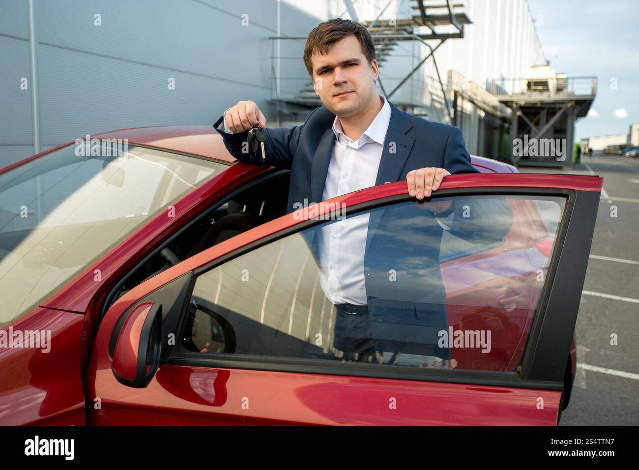 Man leaning against new car hi-res stock photography and images - Alamy