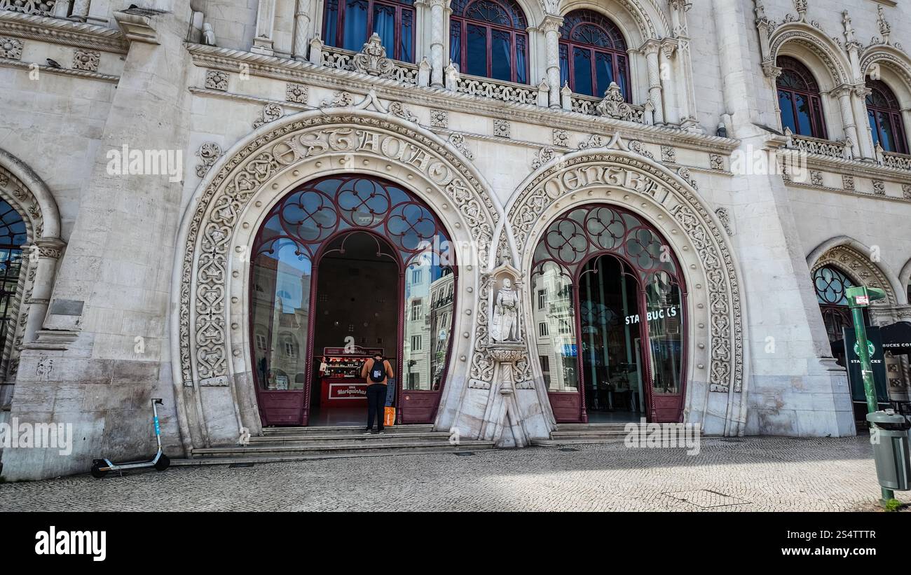 The entrance to Rossio Train Station on Praça Dom Pedro IV, featuring ...