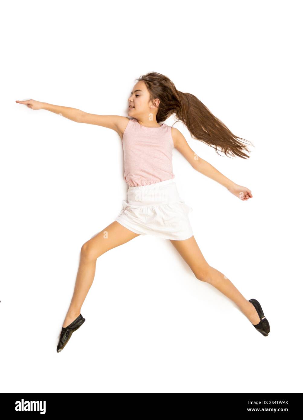 Isolated photo of cute girl jumping in dance Stock Photo - Alamy
