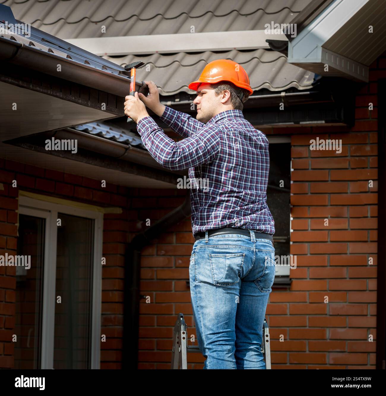 Professional builder climbing high wooden hi-res stock photography and ...