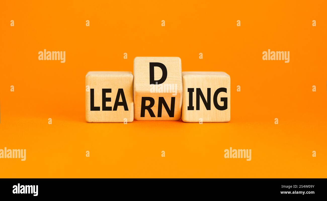 Learning or leading symbol. Concept words Learning Leading on wooden ...