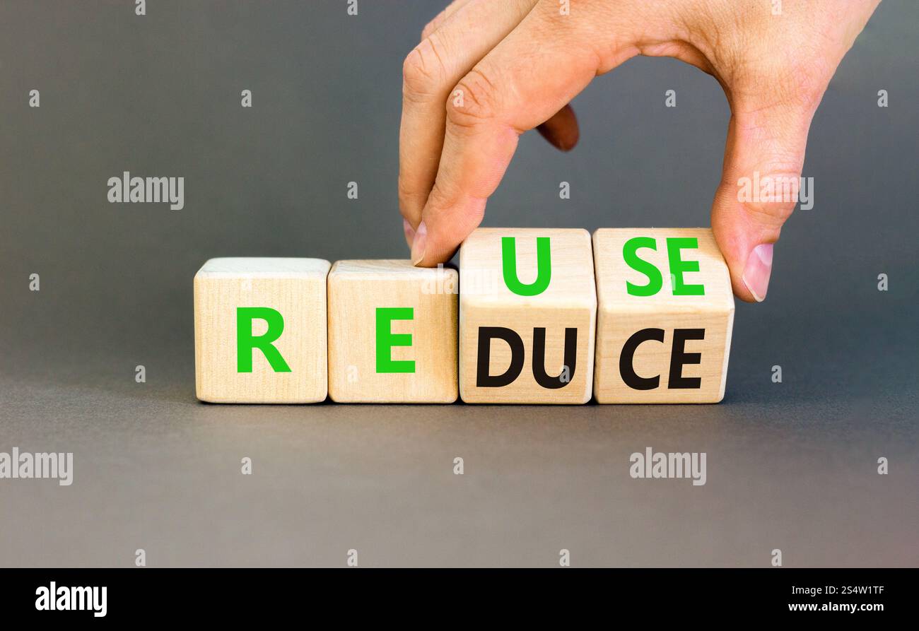 Reuse or reduce symbol. Concept words Reuse Reduce on wooden block ...