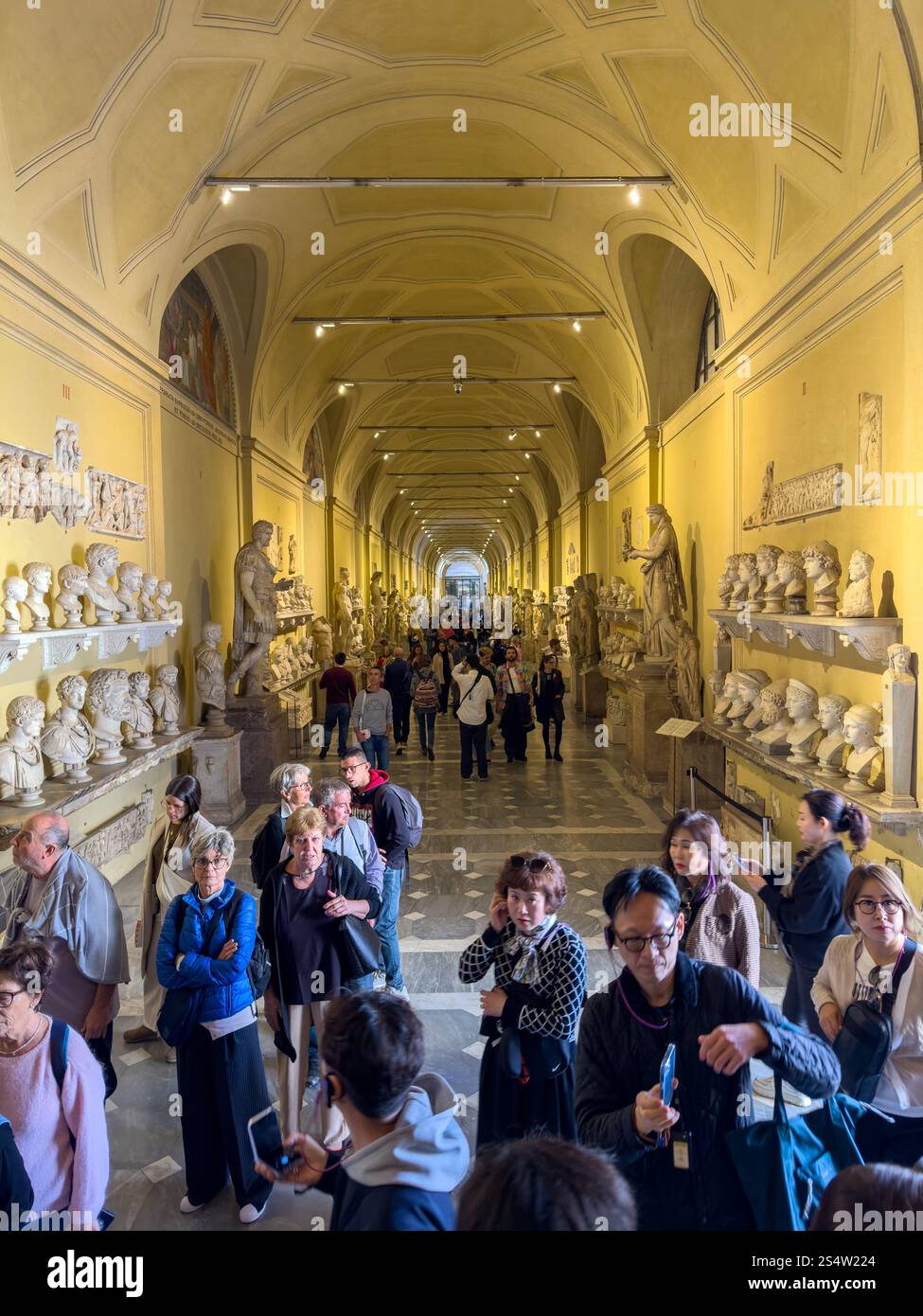 Tourists in the Chiaramonti Museum in the Vatican Museums, Vatican City, Rome, Italy Stock Photo ...