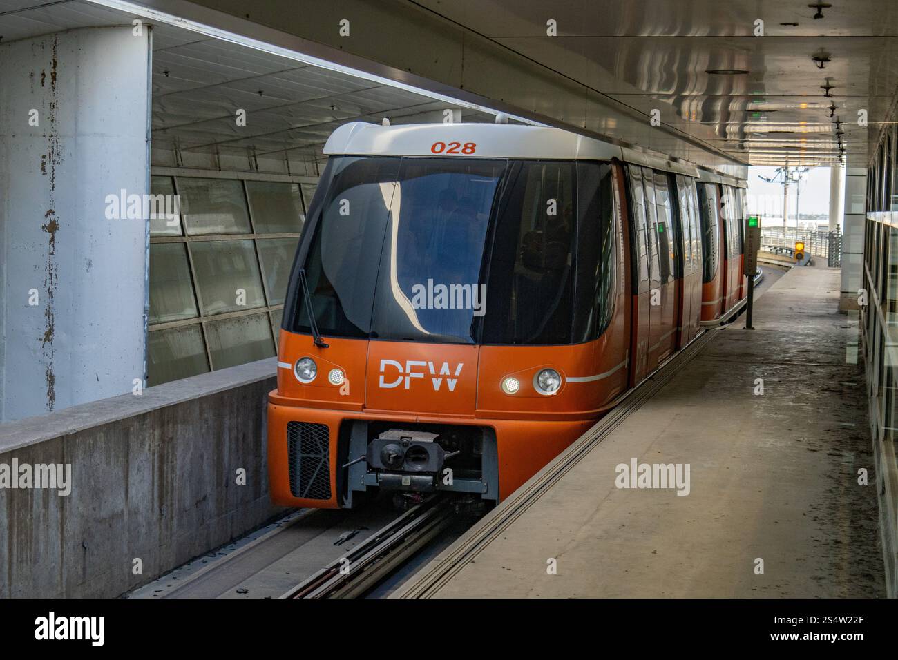 A Skylink light rail train comes into a terminal station at Dallas Fort ...
