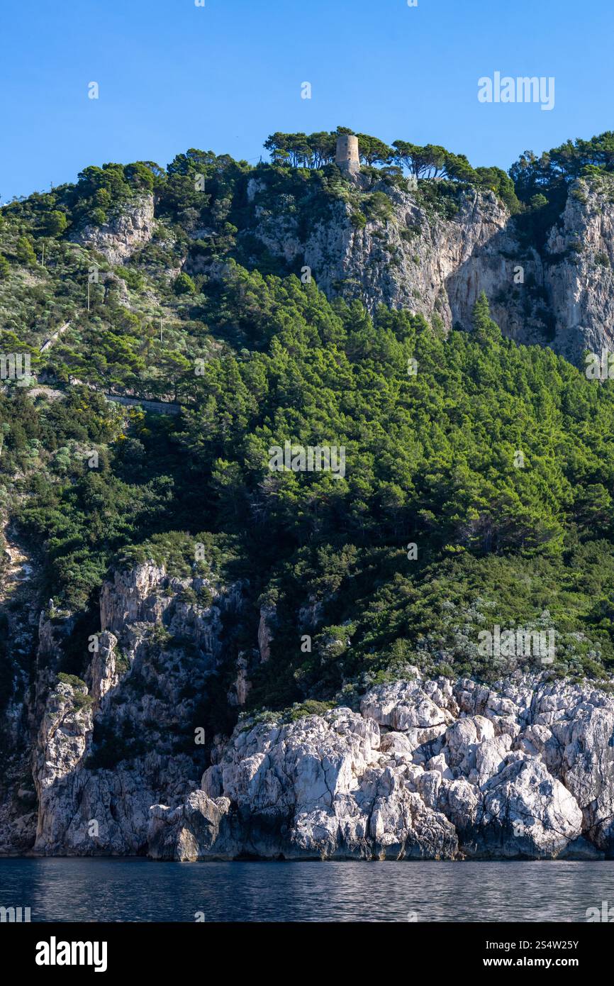 An old watchtower on the cliffs on the west coast of Capri, Italy ...