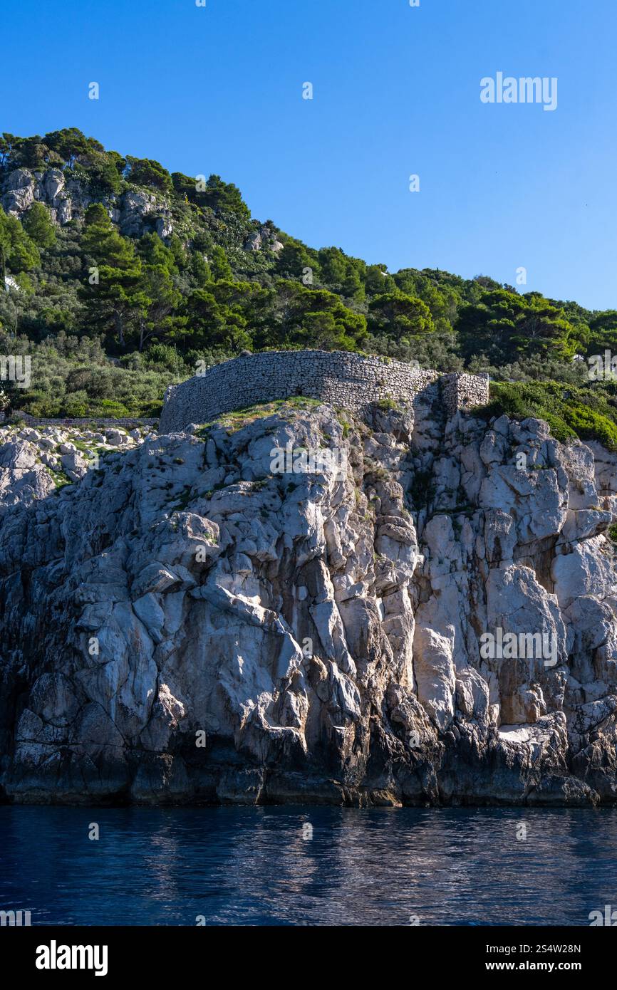 The Orrico Fort on a headland on the west coast of the island of Capri ...