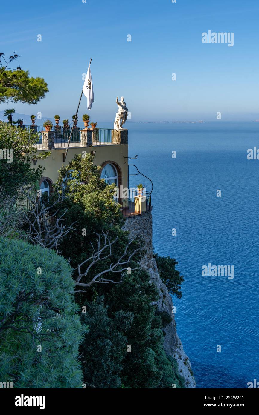 A statue of Augustus Caesar on a cliff-top patio at the Hotel Augustus ...