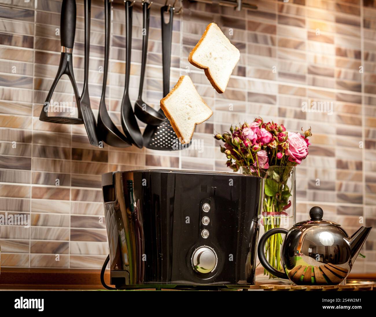 Bread slices popping out toaster hi-res stock photography and images ...