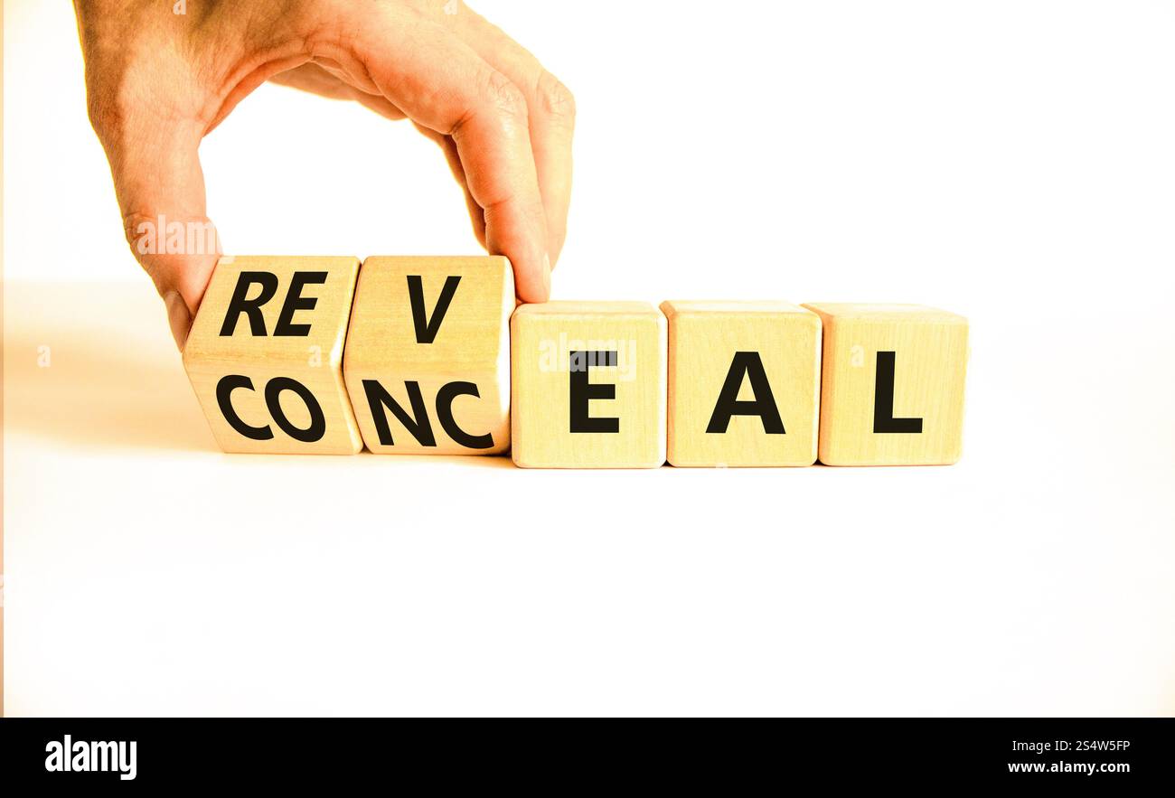 Reveal or conceal symbol. Businessman turns wooden cubes and changes ...