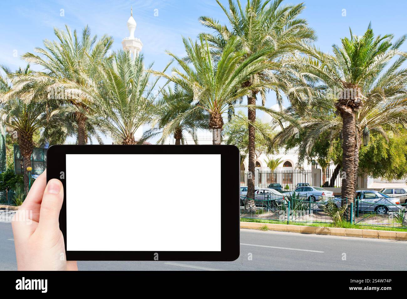 travel concept - tourist photograph Al-Sharif Al Hussein Bin Ali Mosque ...