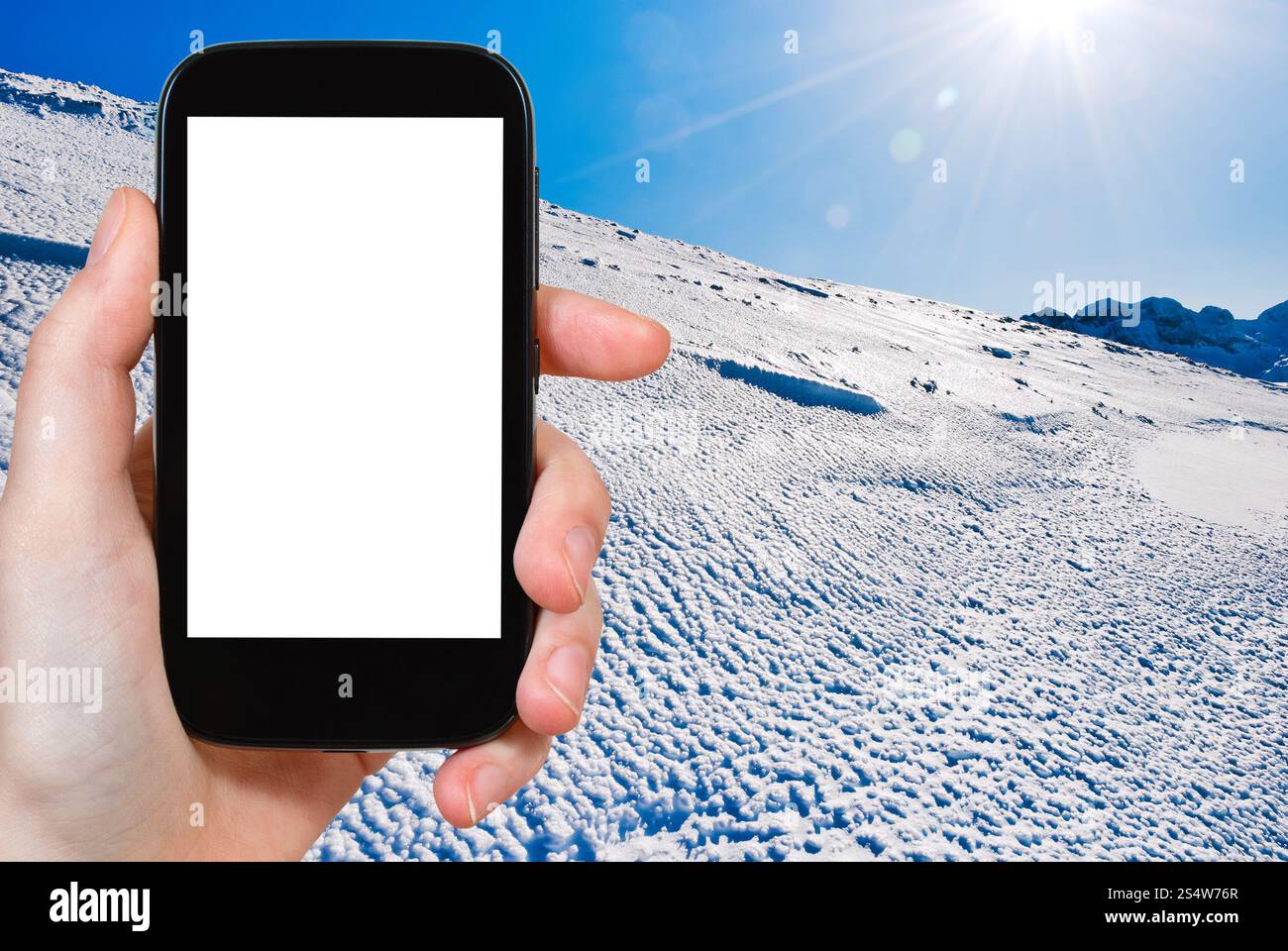 travel concept - tourist photograph blue cold snow on Alps mountain in ...