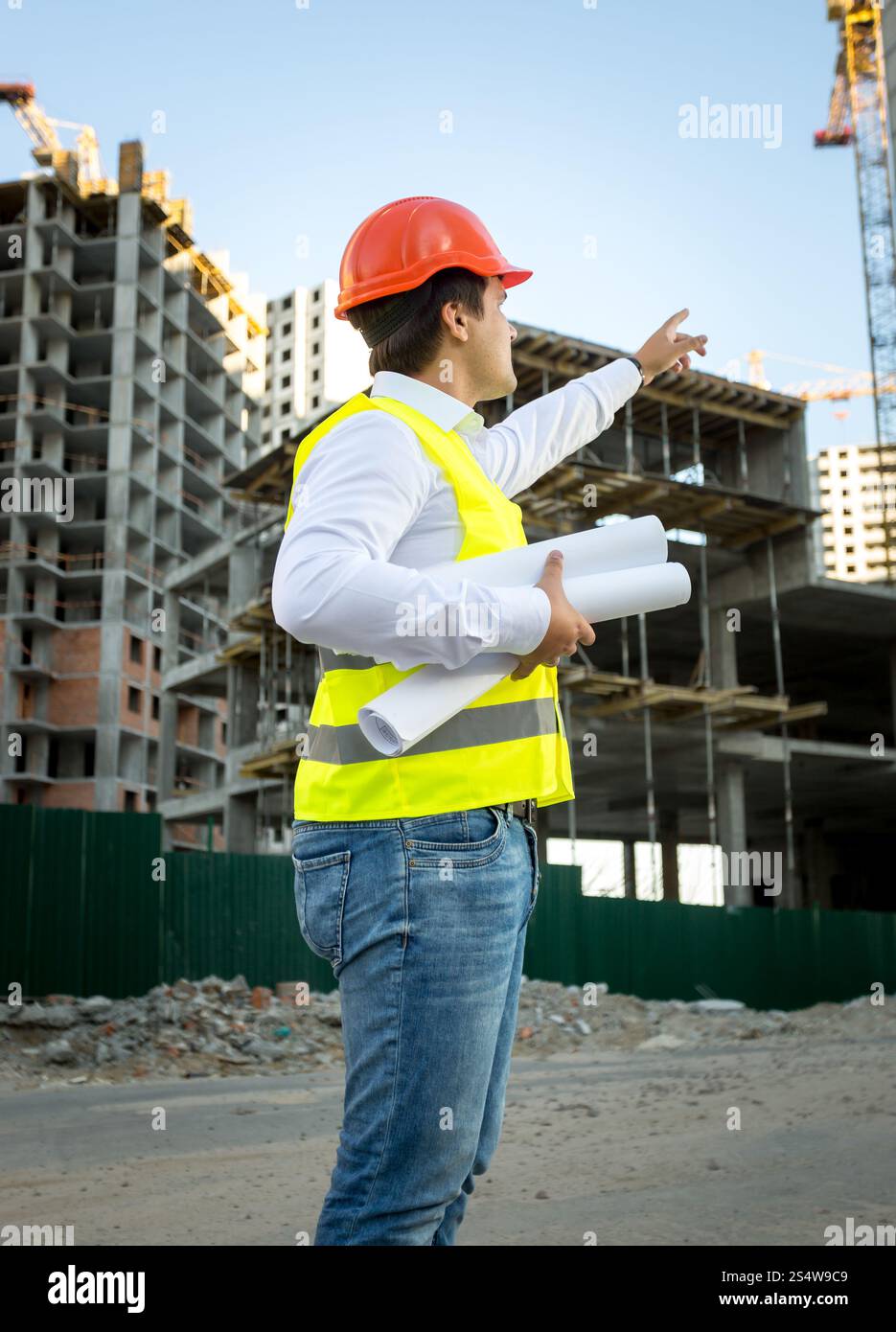 Engineer checking blueprint work hi-res stock photography and images ...