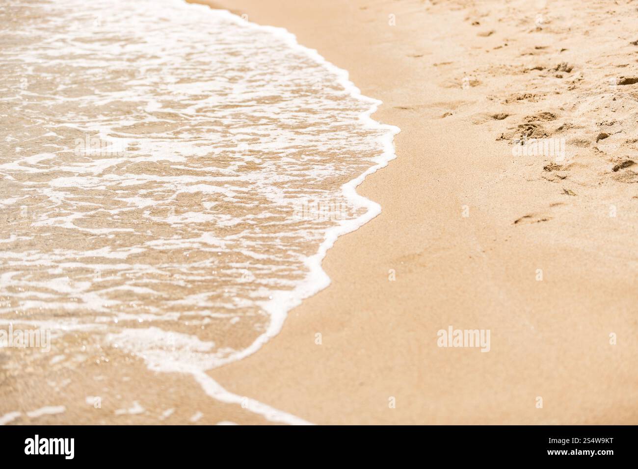 Ocean waves on sandy shore hi-res stock photography and images - Alamy